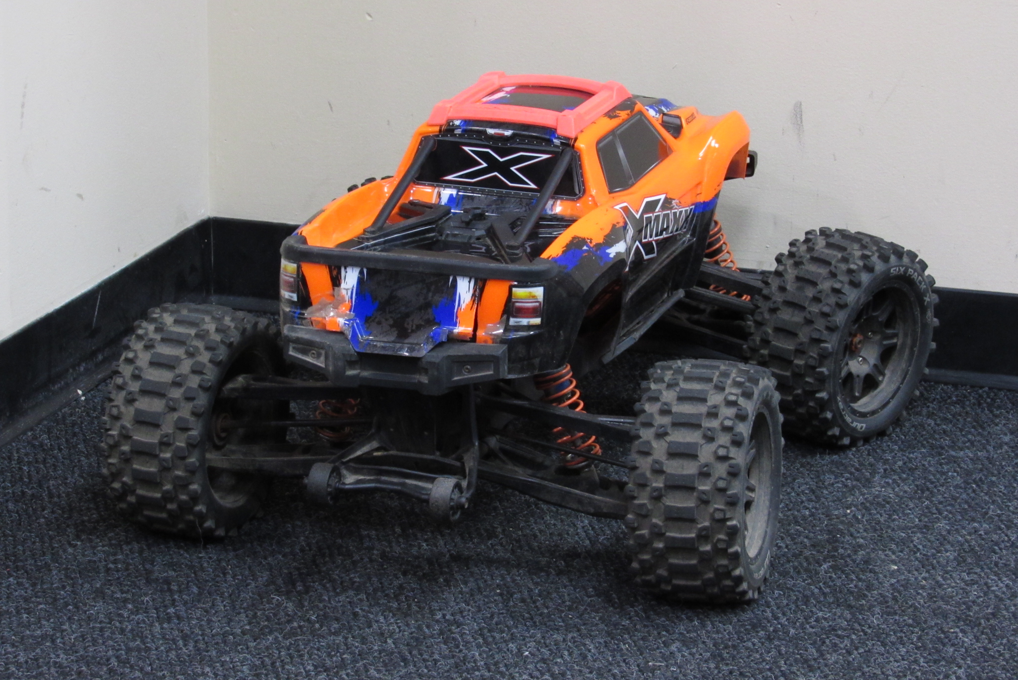 Traxxas X-Maxx Remote Control Monster Truck - Orange/Blue/Black Shell
