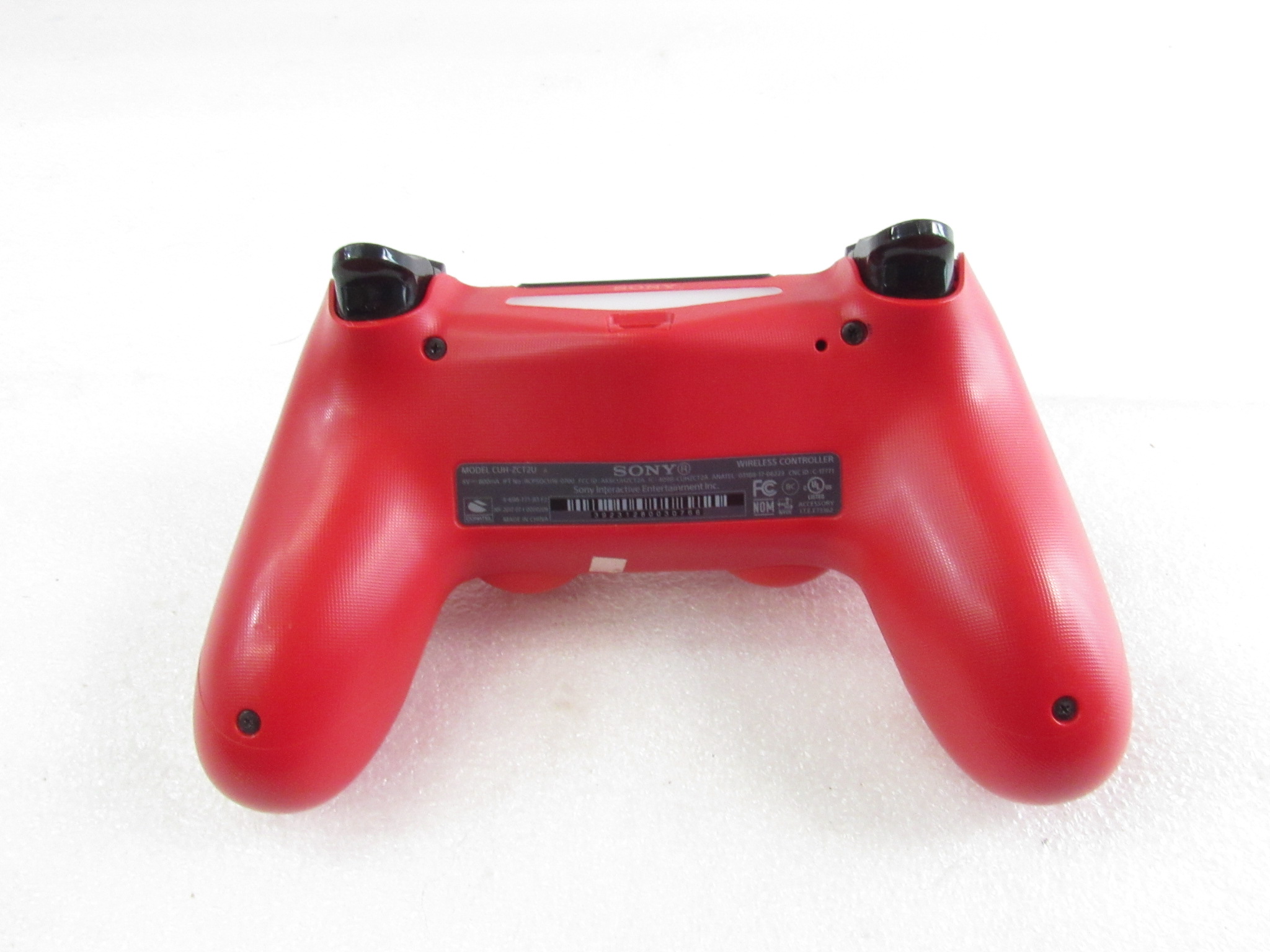 Sony DualShock 4 CUH-ZCT2U for the PlayStation 4 Video Game Controller Red