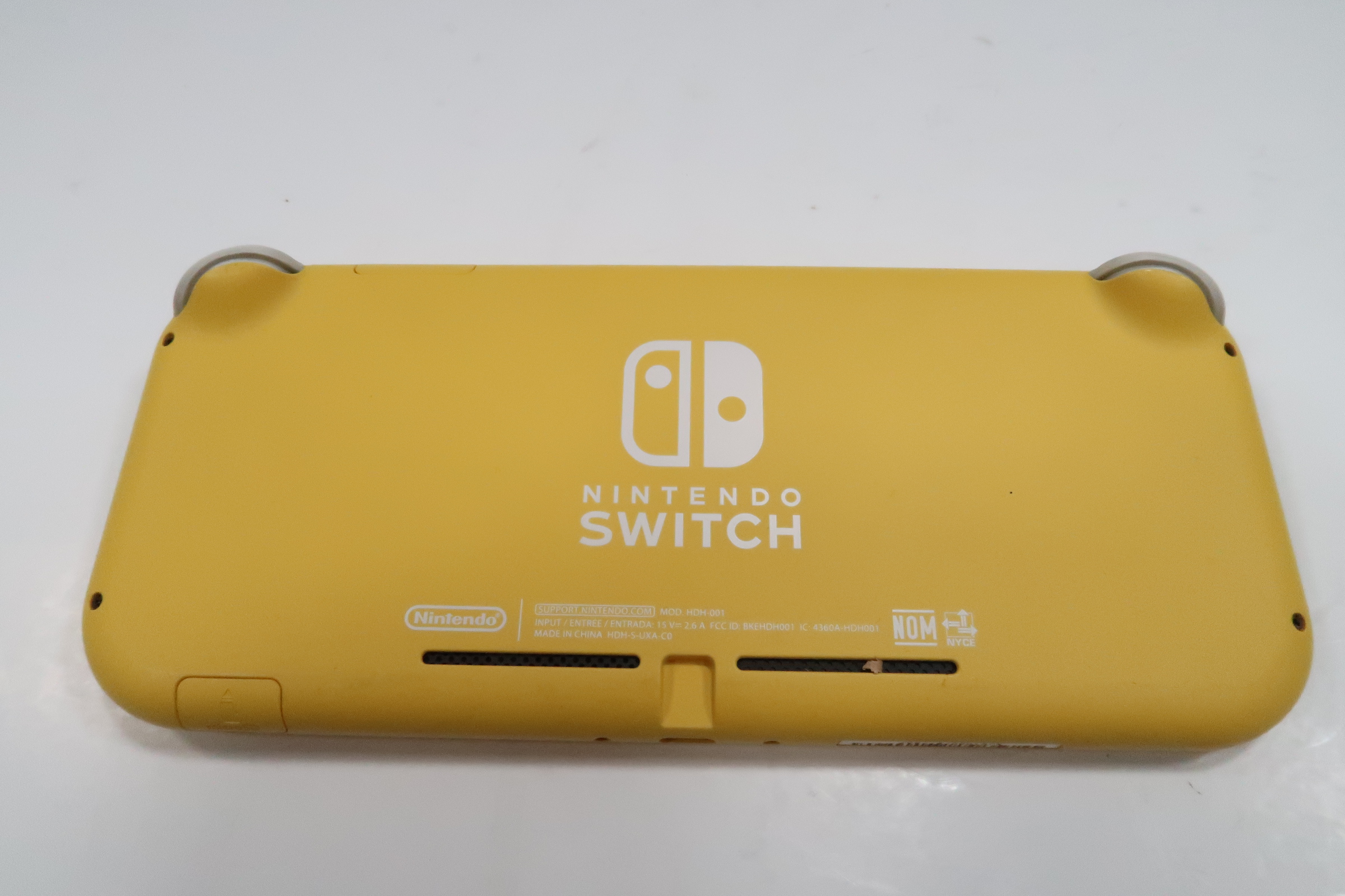 Nintendo HDH-001 Switch Lite Handheld Video Game Console - Yellow 7298