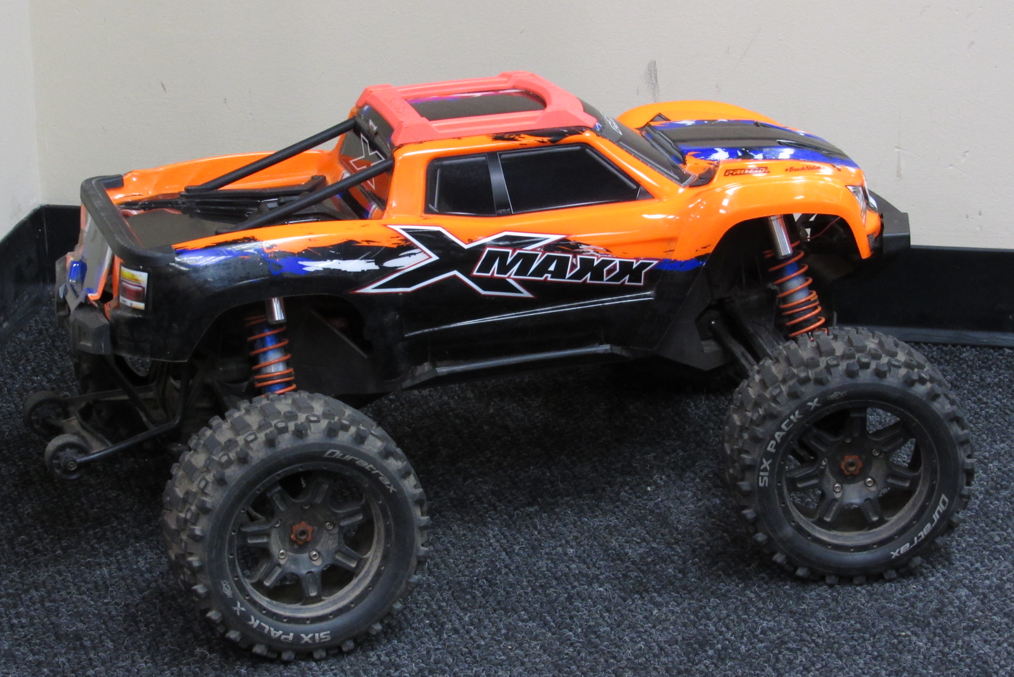 Traxxas X-Maxx Remote Control Monster Truck - Orange/Blue/Black Shell